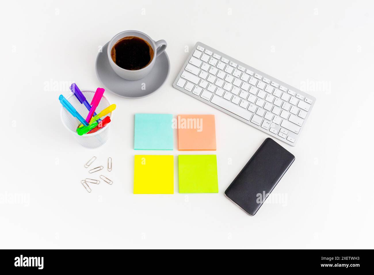 Office desk table with supplies, sticky notes and coloured pens. Top ...
