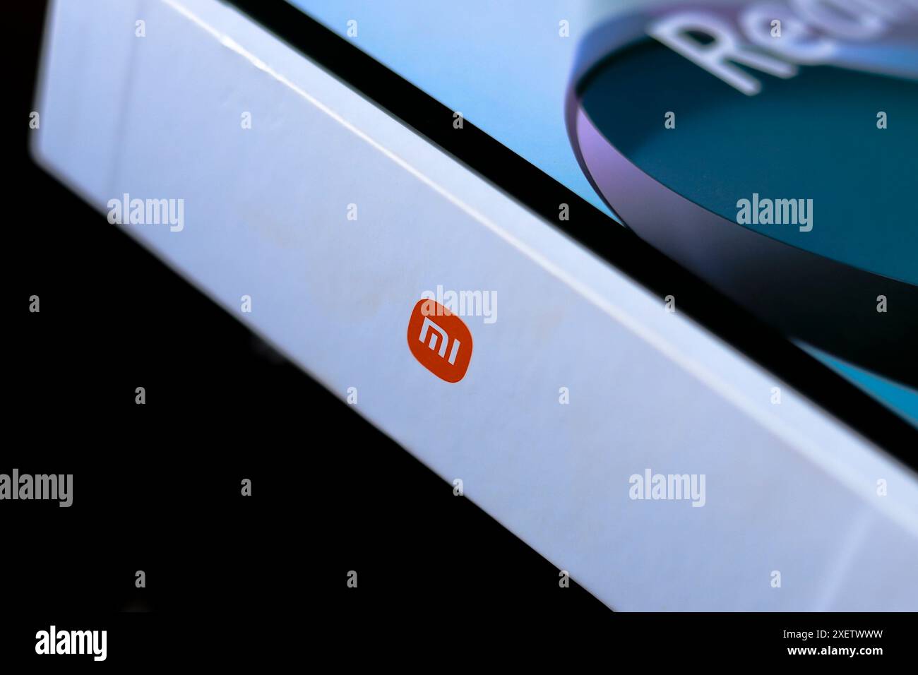 In this photo illustration, the Xiaomi logo on the packaging of a Redmi ...