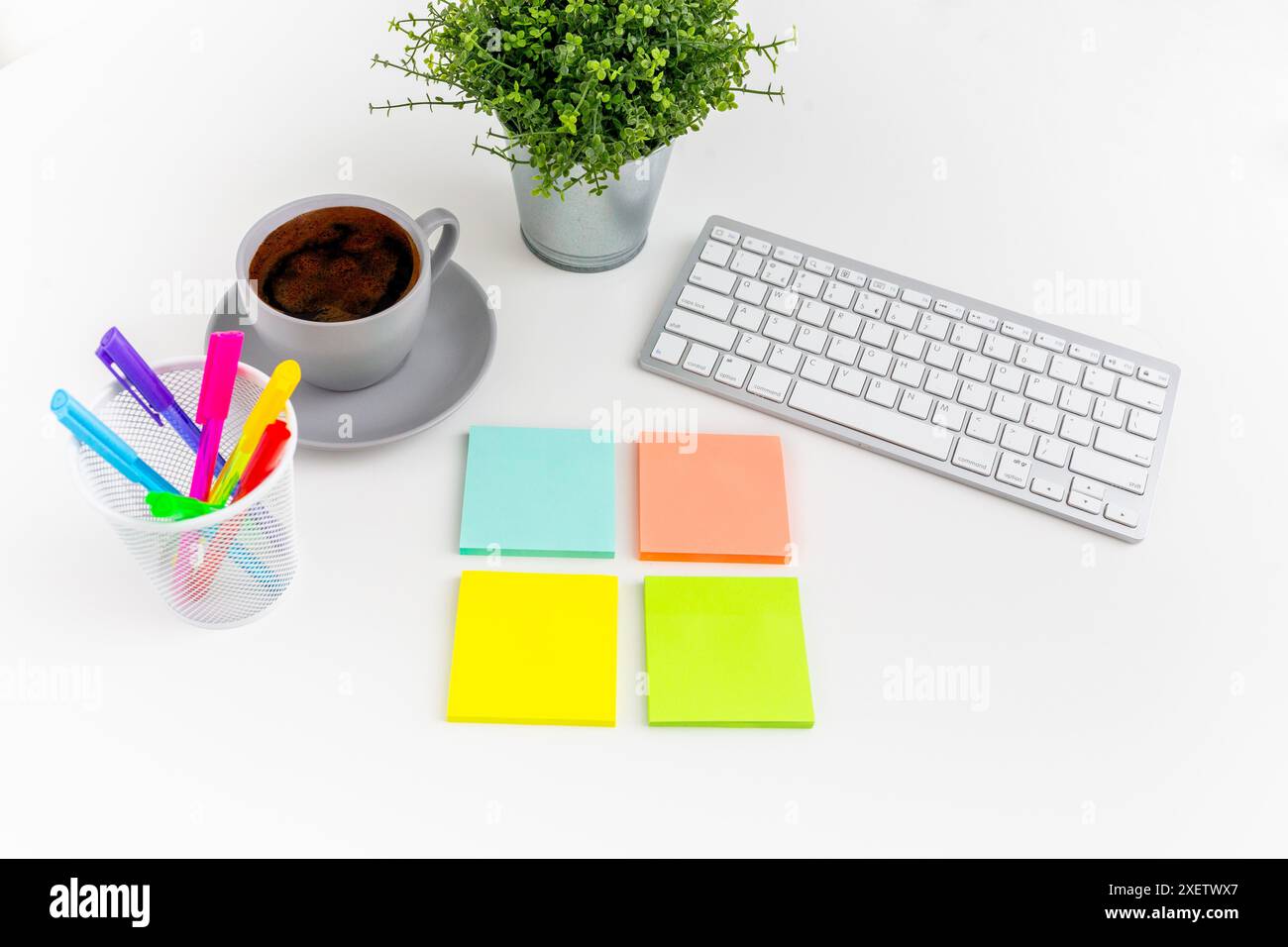 Office desk table with supplies, sticky notes and coloured pens. Top ...