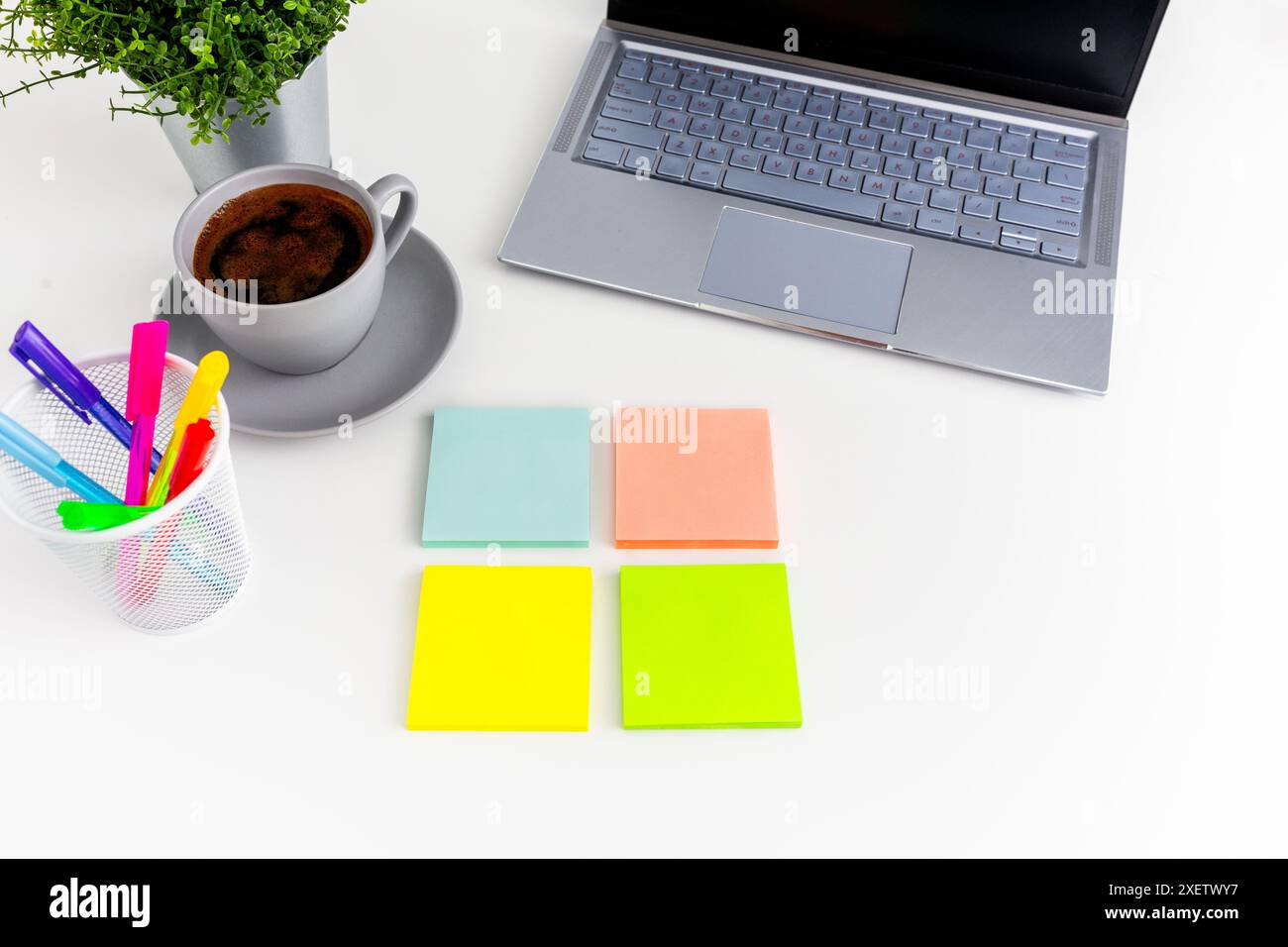 Office desk table with supplies, sticky notes and coloured pens. Top ...