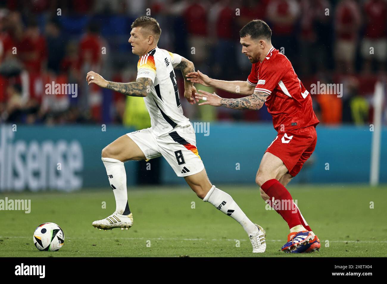 Dortmund - (l-r) Toni Kroos of Germany, Pierre-Emile Hojbjerg of ...