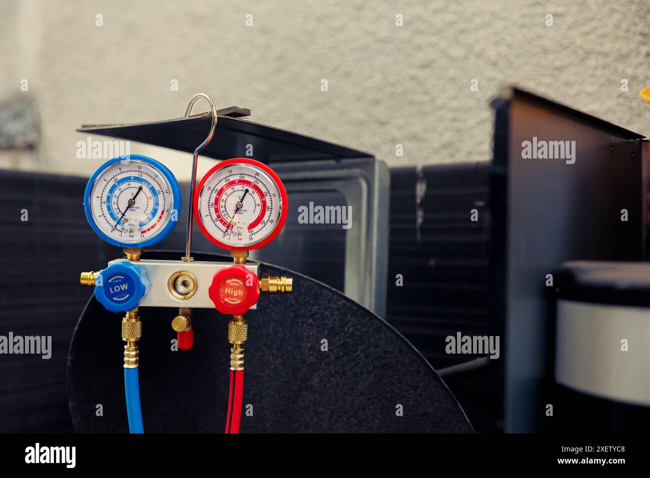 Close up of manifold gauges used for checking air conditioner ...