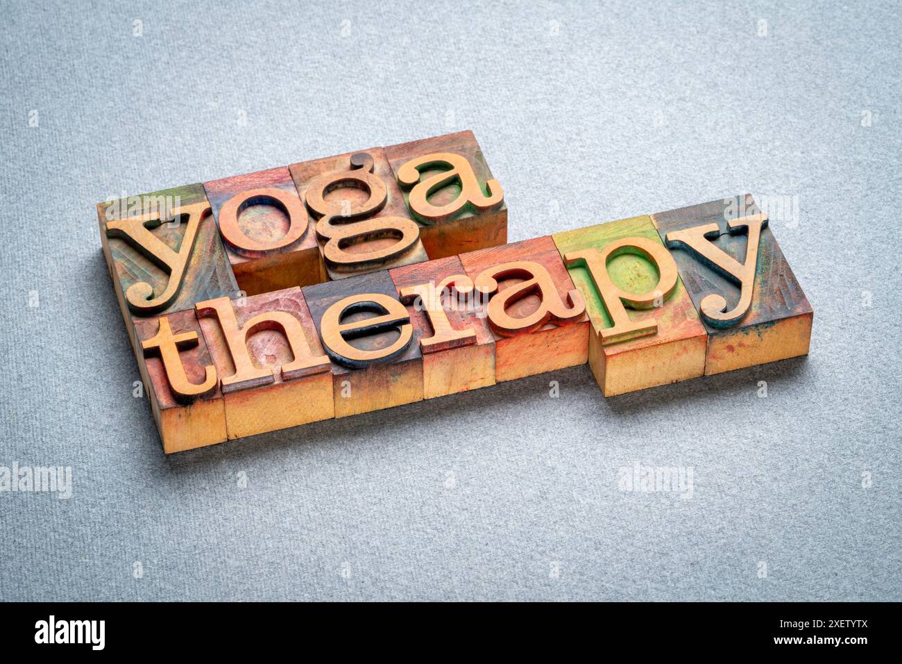 yoga therapy - text in retro letterpress wood type stained by color ...