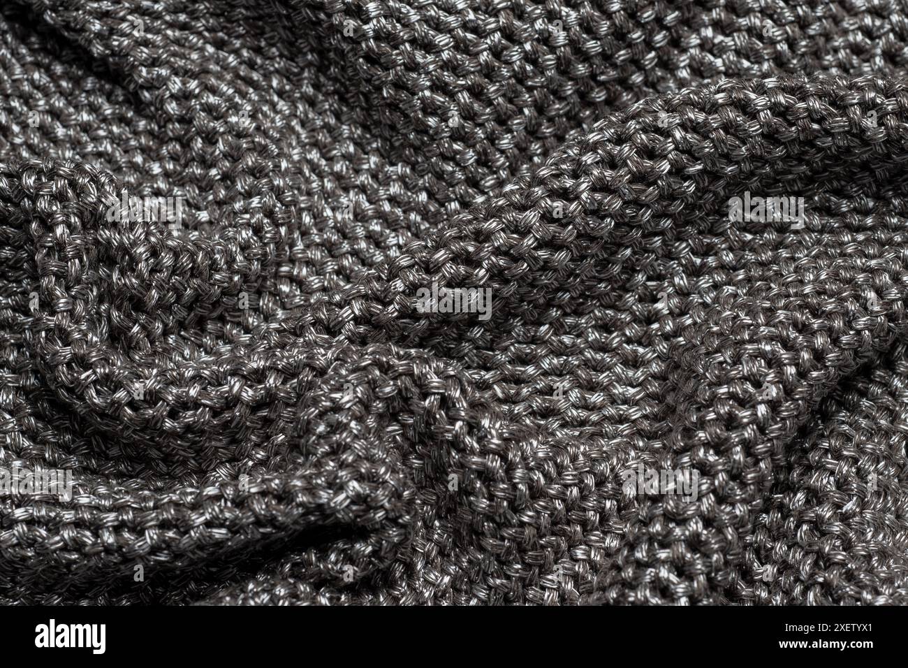 Wrinkled silver fabric that looks like chainmail Stock Photo - Alamy
