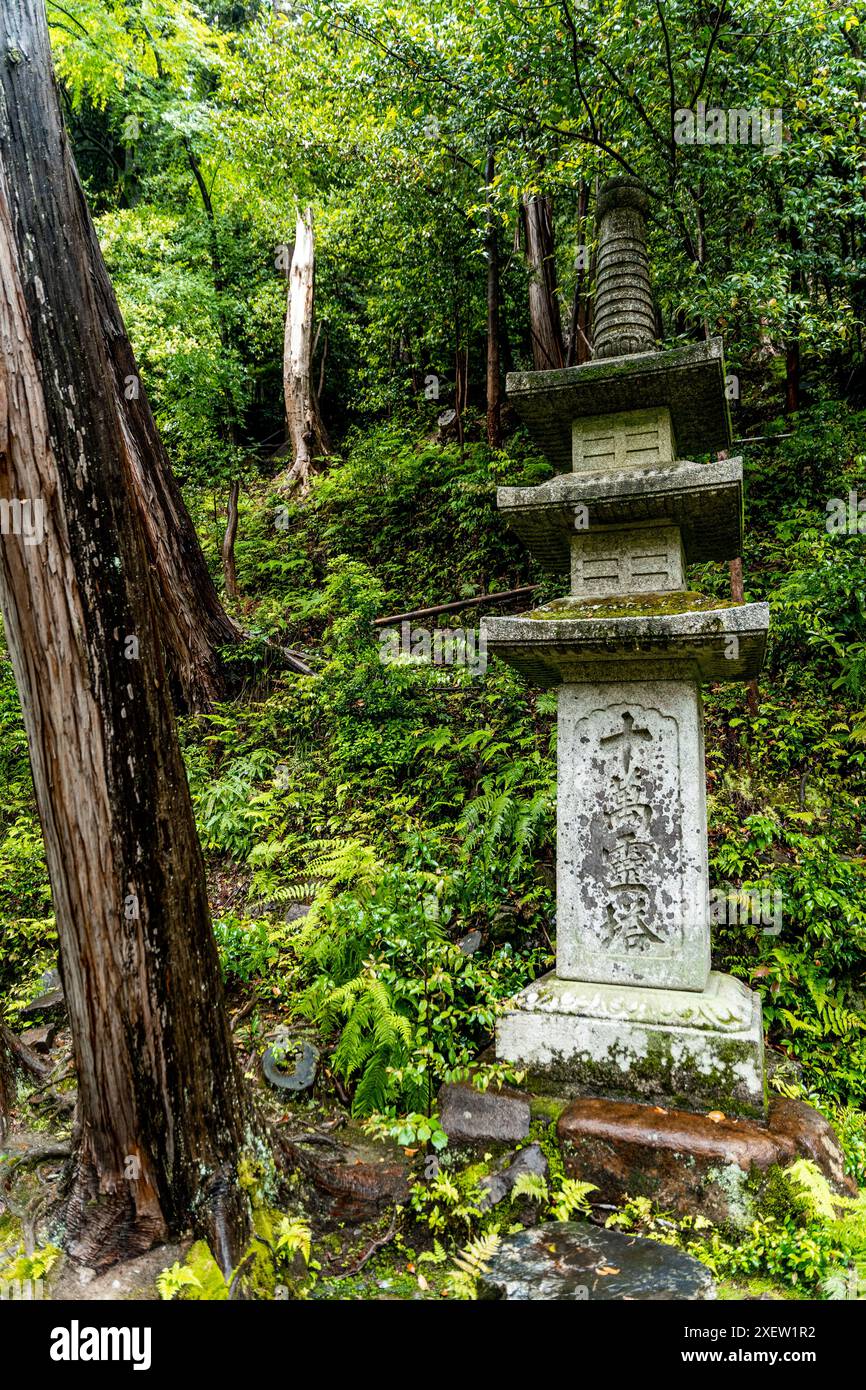 A stone pagoda in the precints of Honen-in Buddhist temple, near the ...