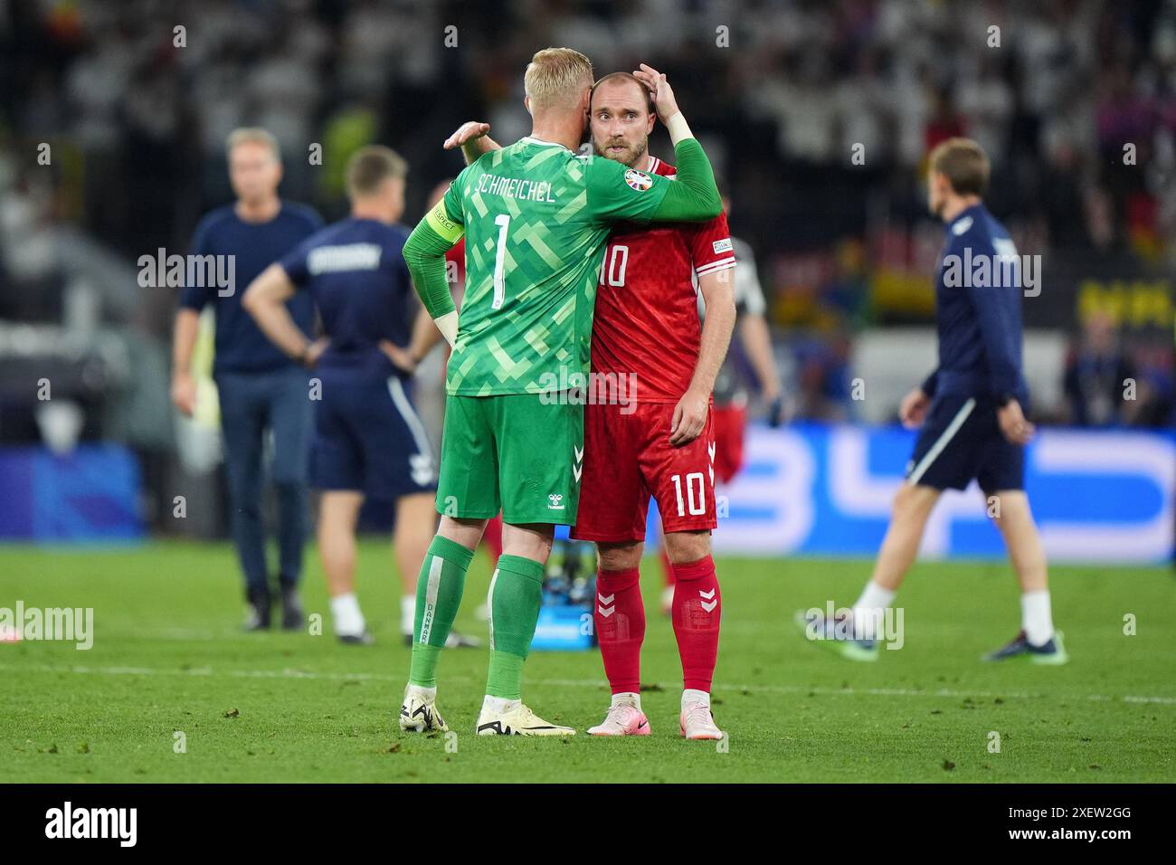 Denmark's Christian Eriksen and goalkeeper Kasper Schmeichel react at ...