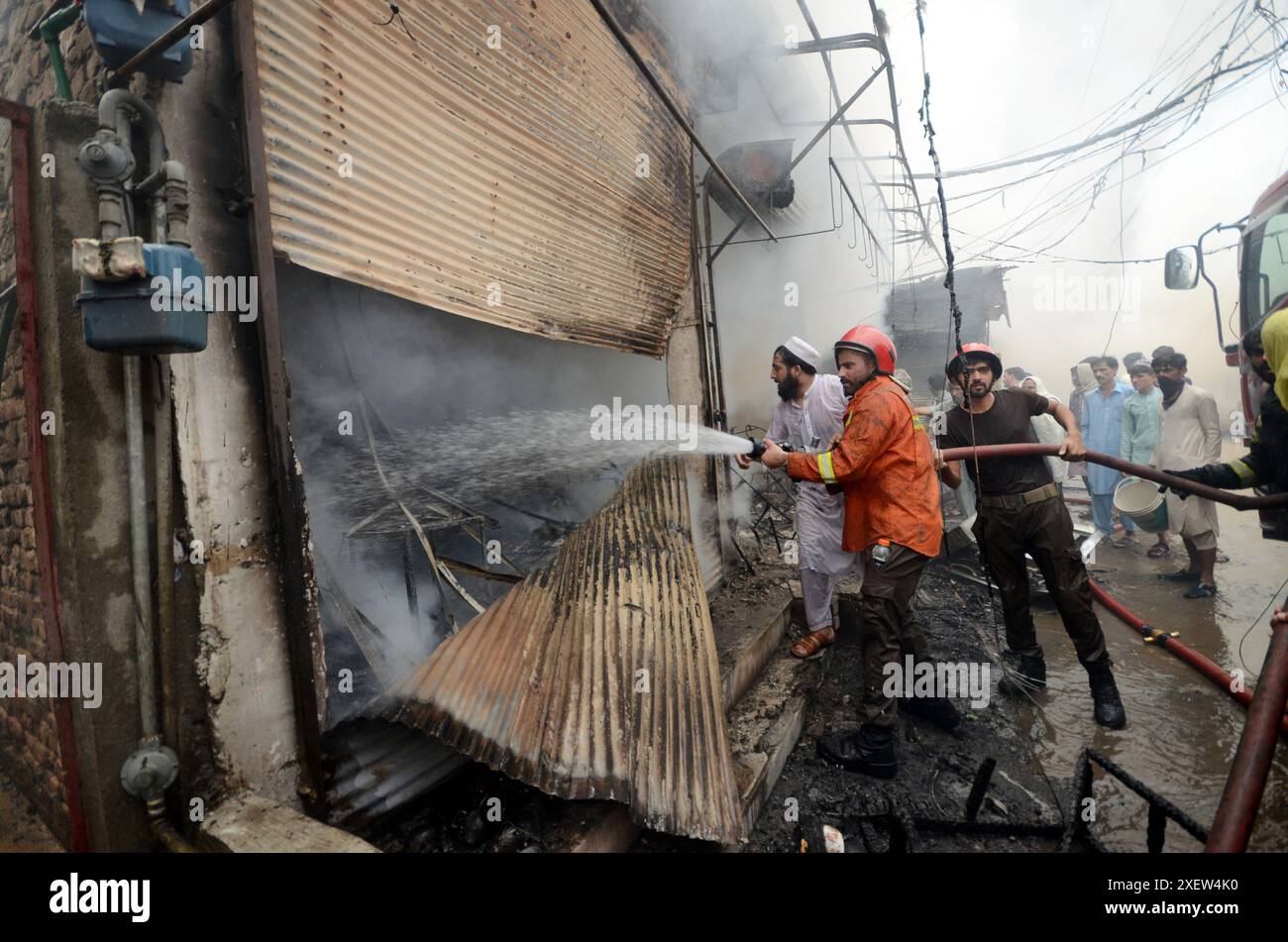 June 29, 2024, Peshawar, Peshawar, Pakistan: A fire broke out in shops ...