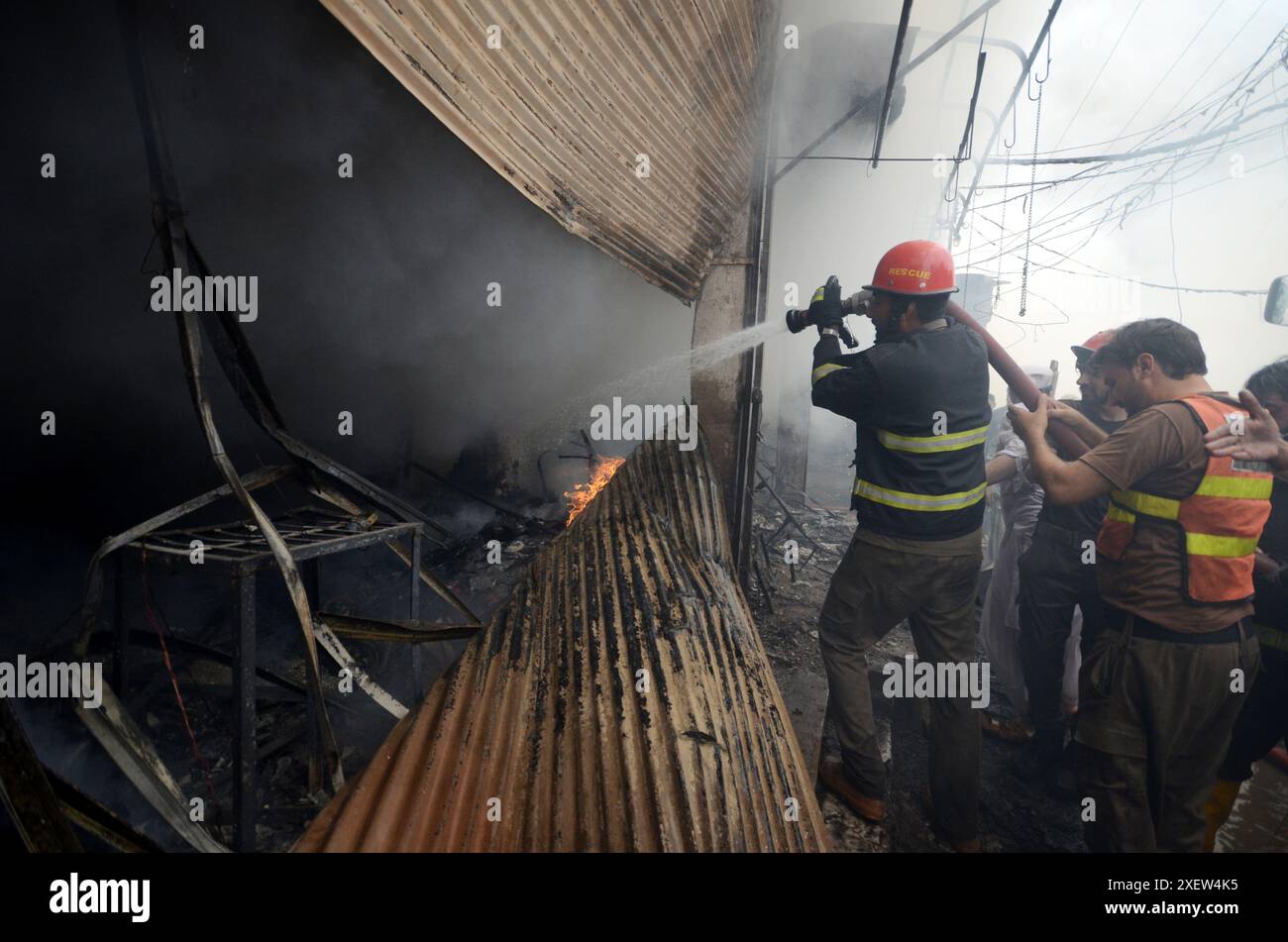 June 29, 2024, Peshawar, Peshawar, Pakistan: A fire broke out in shops ...