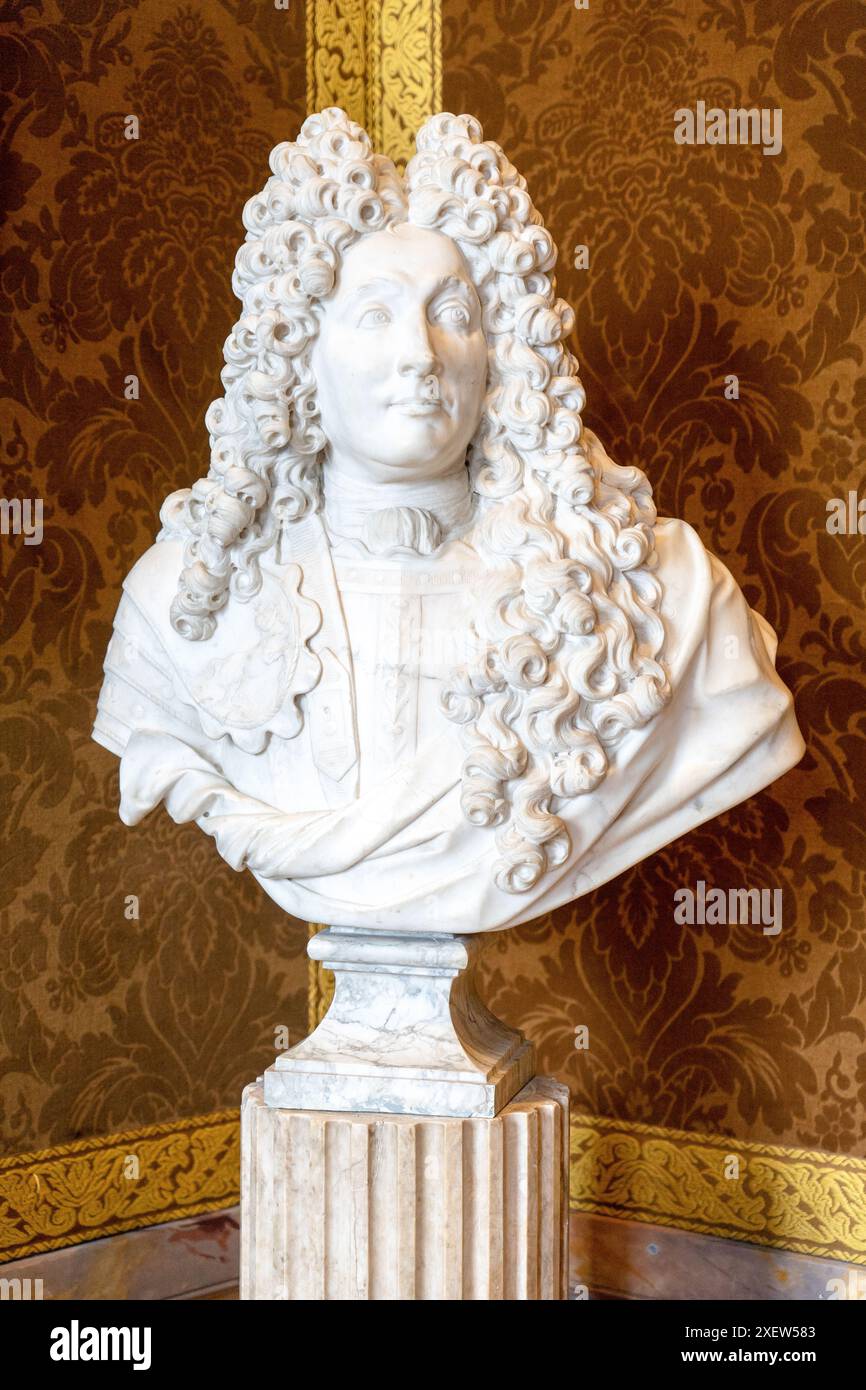 White stone statue of historical character in the palace of Versailles ...