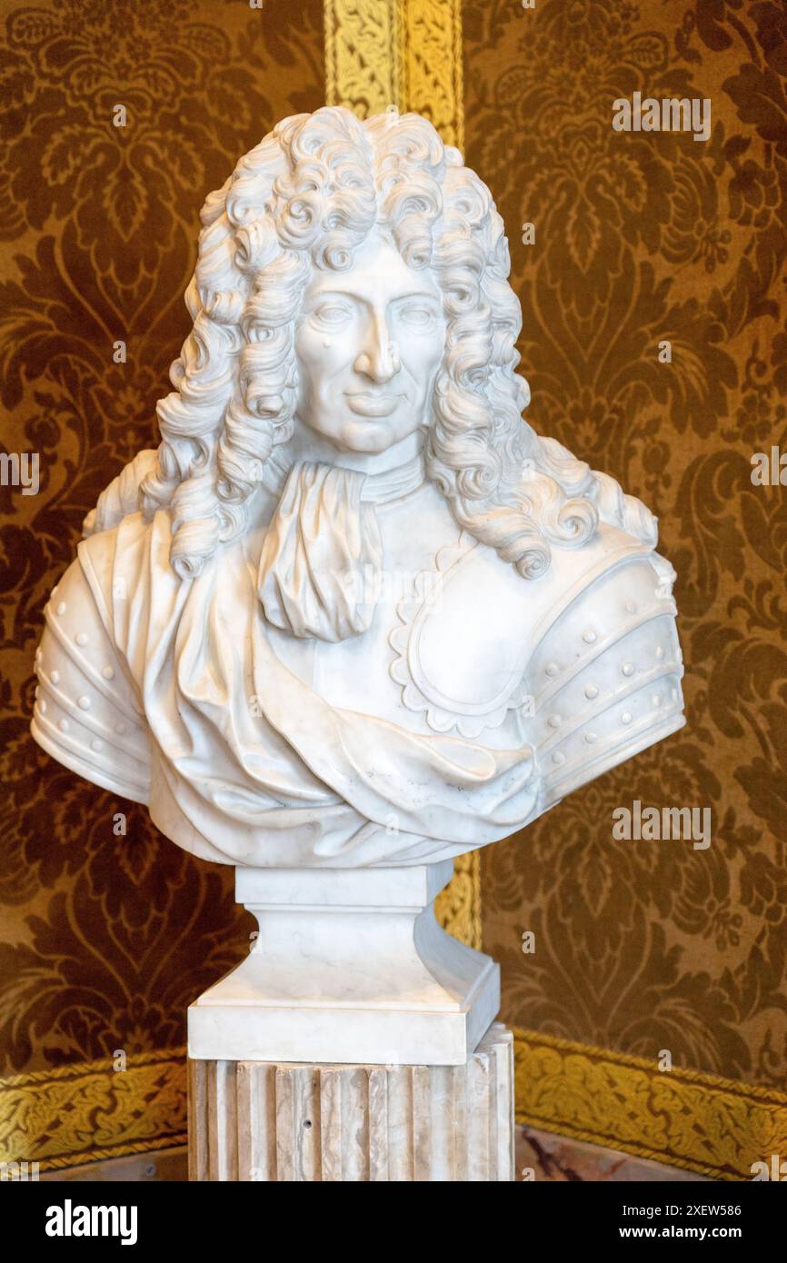 White stone statue of historical character in the palace of Versailles ...