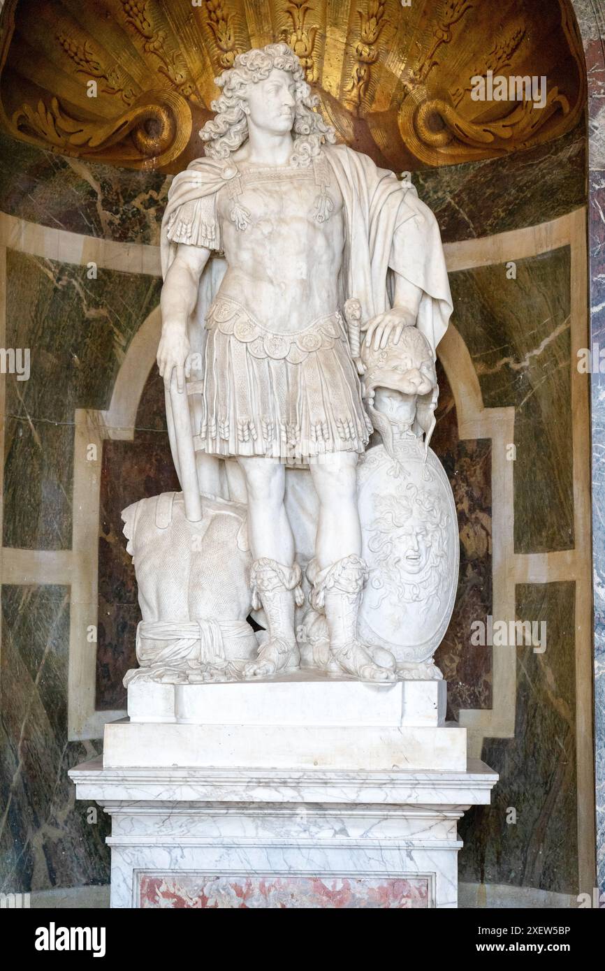 White stone statue of historical character in the palace of Versailles ...