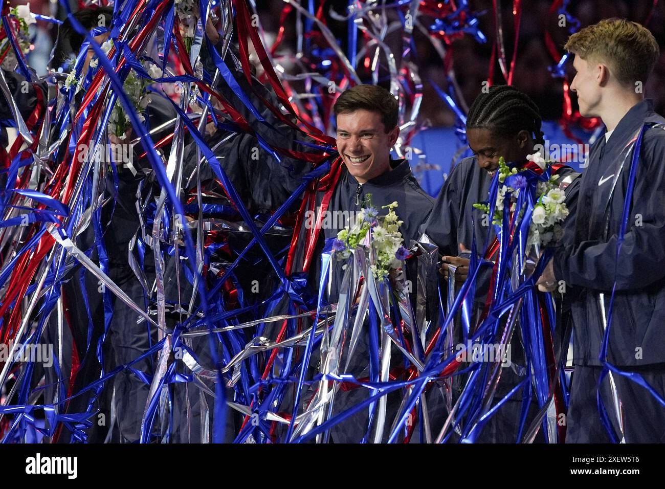Brody Malone, center left, celebrates alongside Khoi Young, second from ...