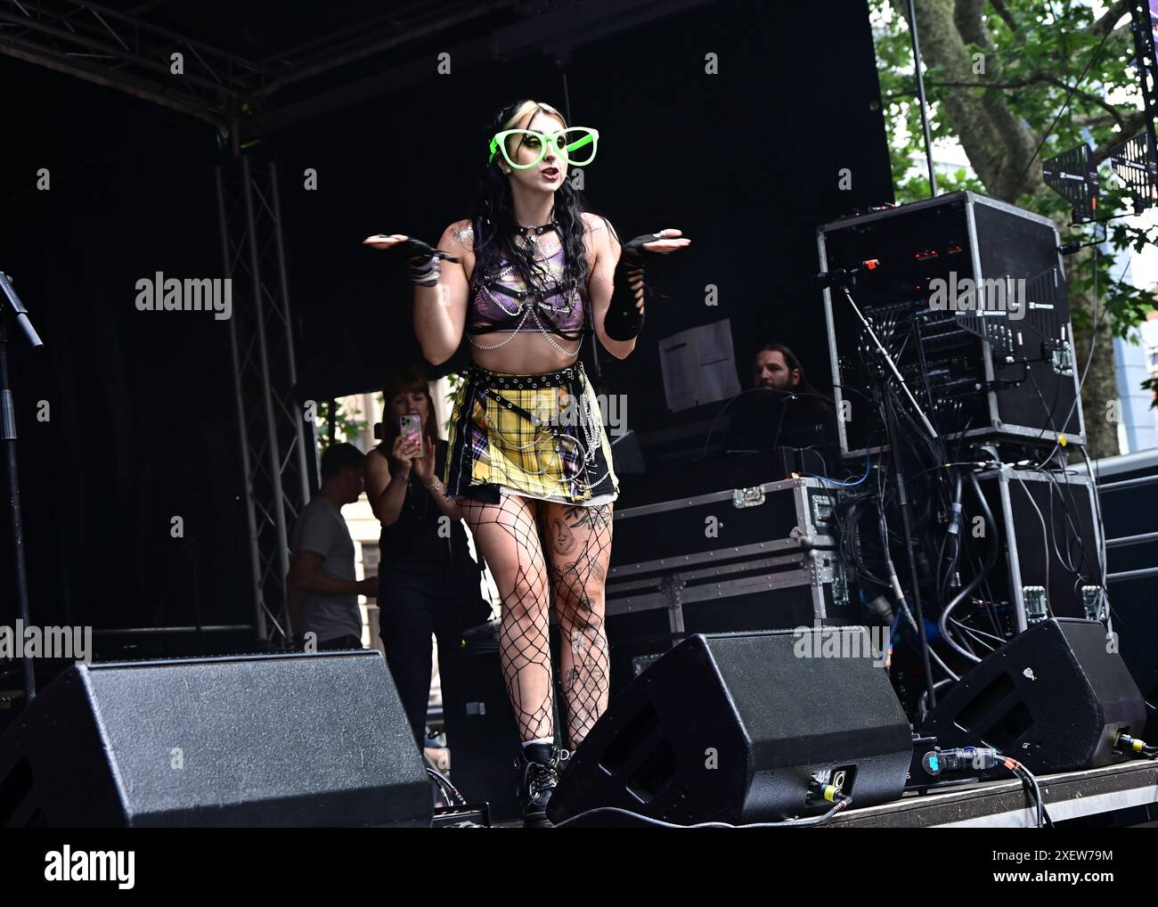 LONDON, UK. 29th June, 2024. Singer Delilah Bon (M) dancer Ruena (L ...