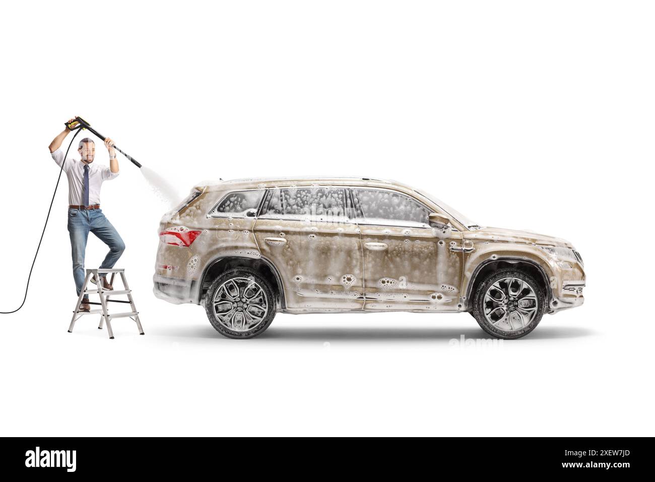 Man on a ladder using a high pressure washer machine and cleaning a SUV ...