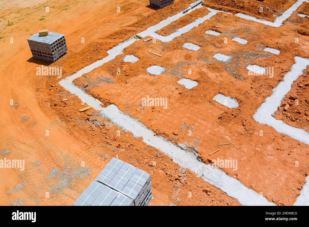 Cement blocks delivered to construction site with foundation is ready ...