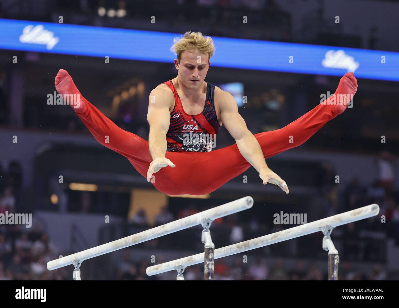 June 29, 2024: Colt Walker competes on the parallel bars during the ...