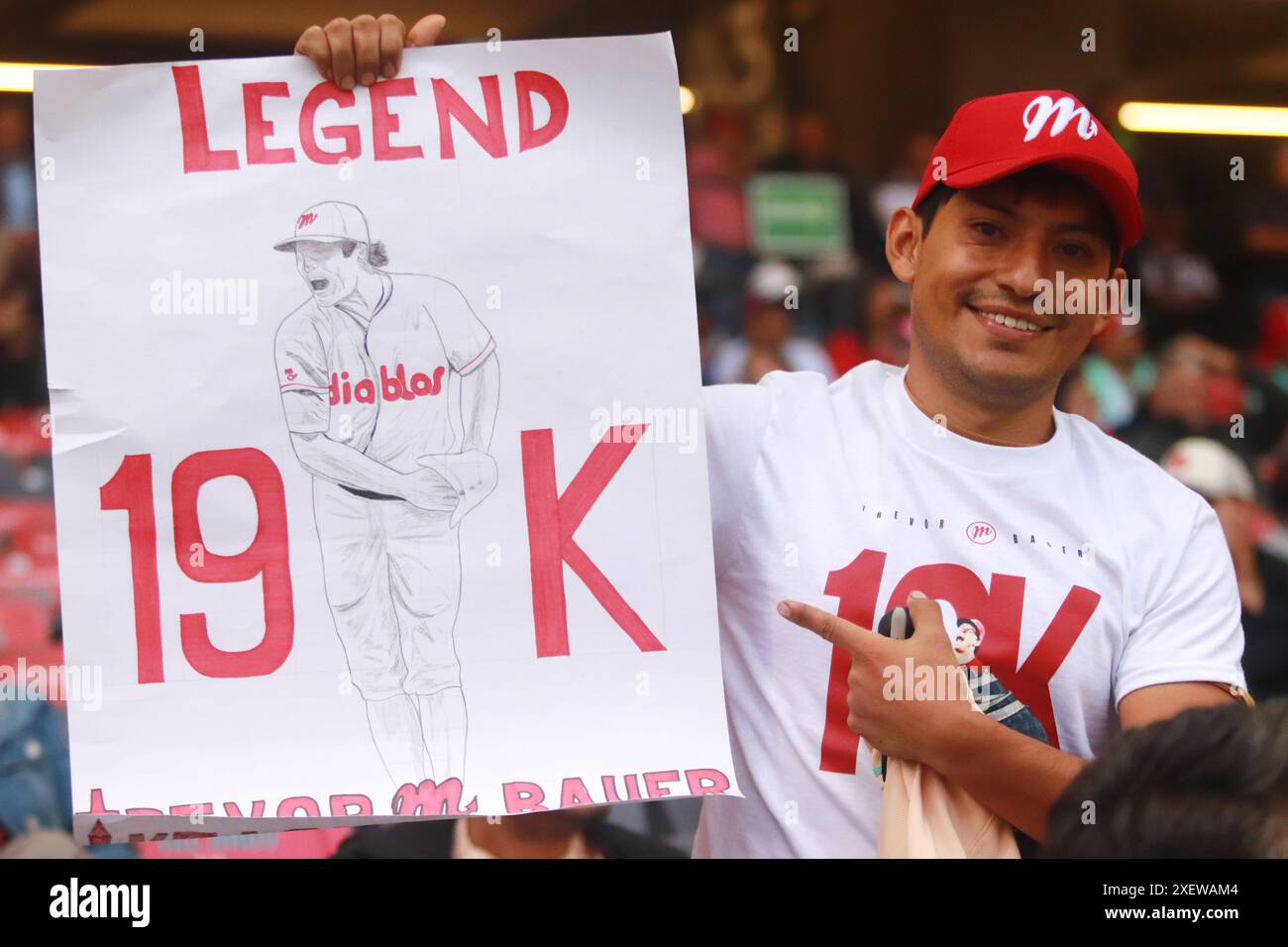 A Diablos Rojos Fan shows a drawing of Trevor Bauer and his 19 K record ...
