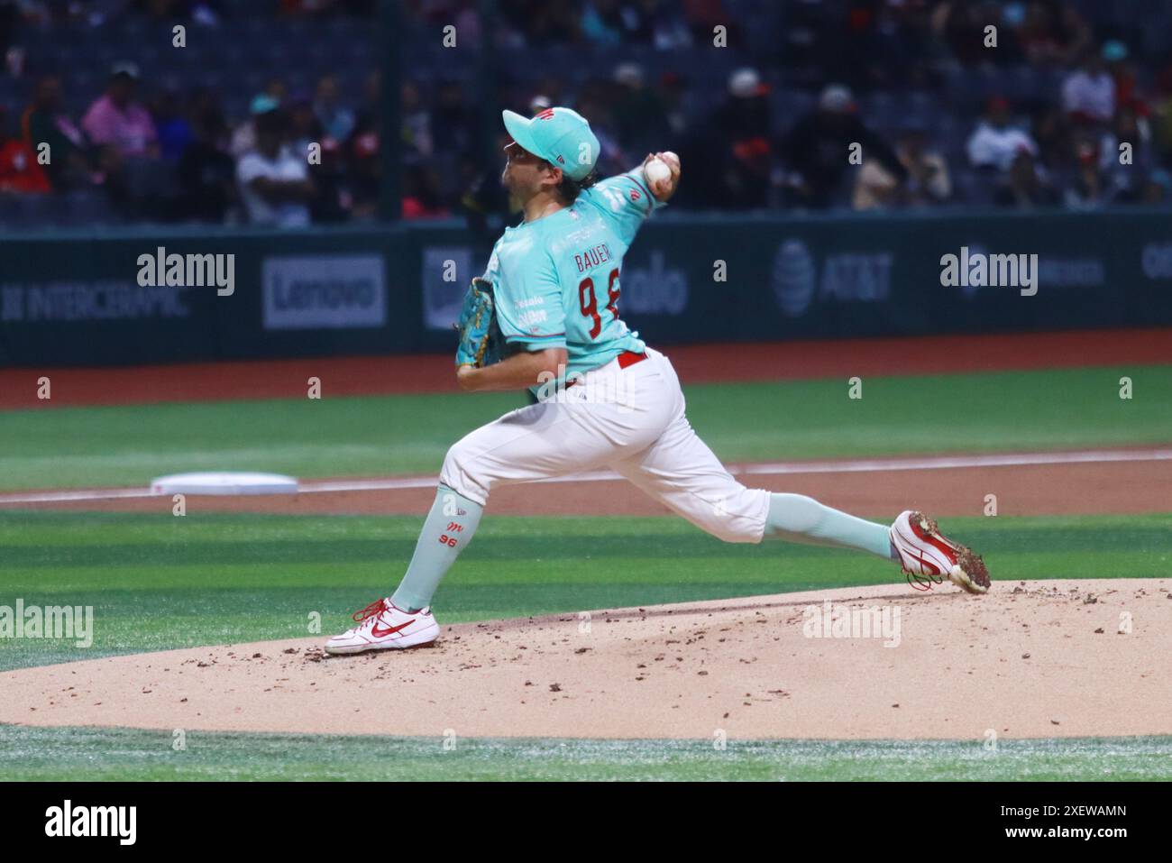 Trevor Bauer #96 of Diablos Rojos pitches the ball against Leones de ...