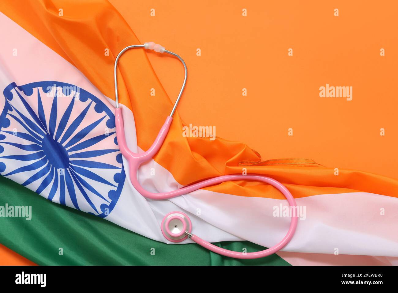 Stethoscope and flag of India on orange background. National Doctor's ...