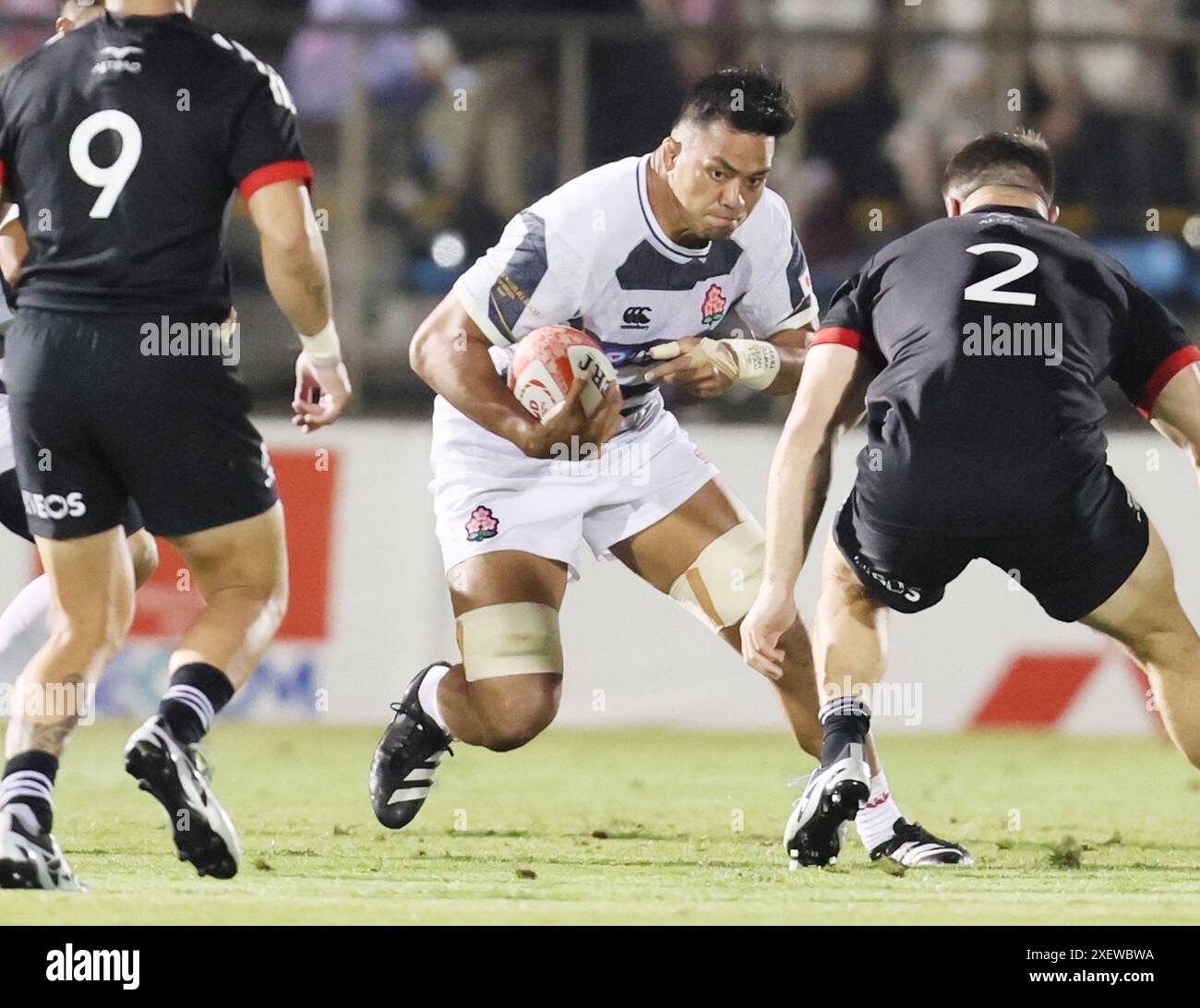Tokyo, Japan. 29th June, 2024. Japan's prop Keijiro Tamefusa carries ...