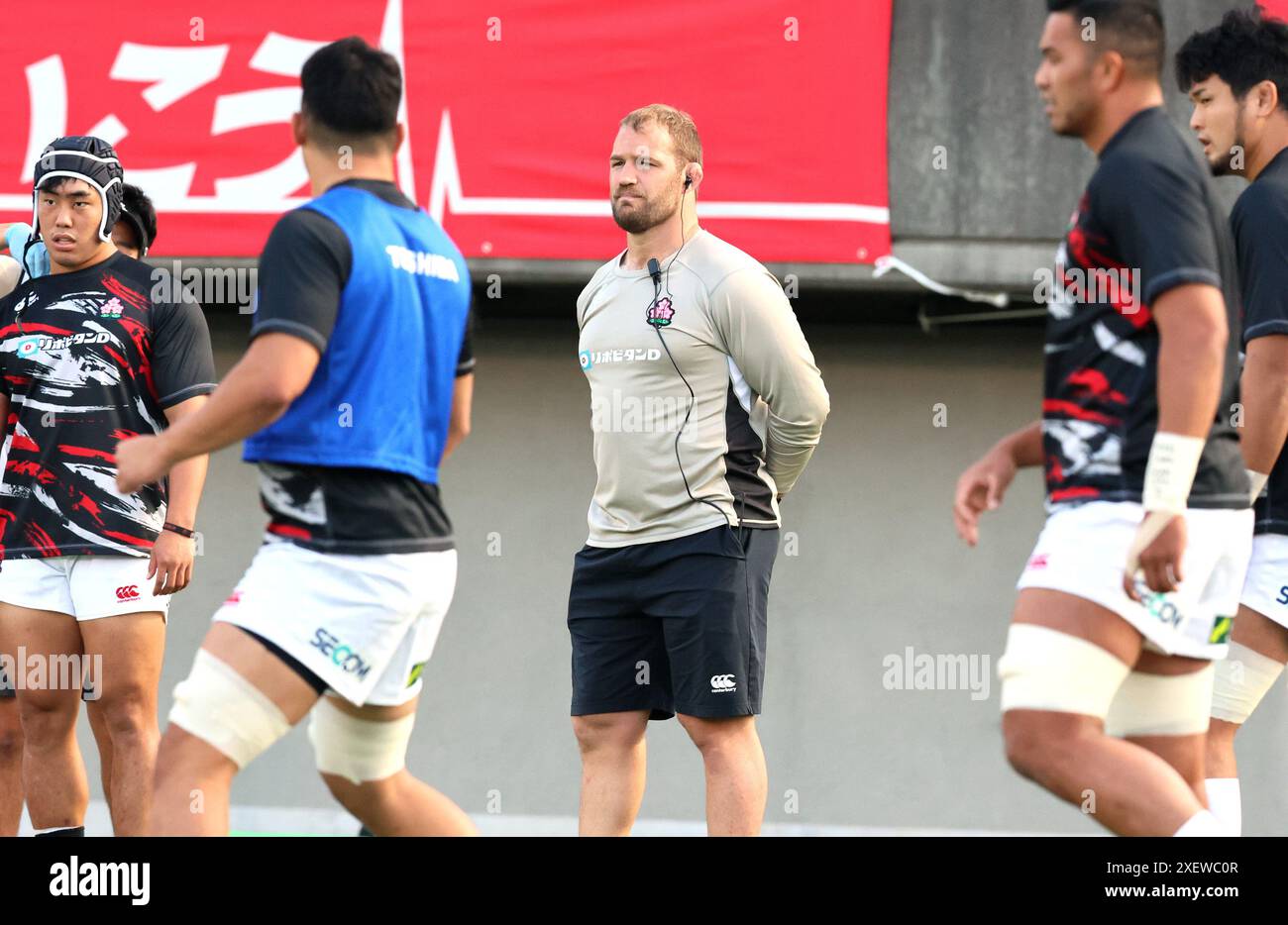 Tokyo, Japan. 29th June, 2024. Japan's assistant coach Owen Franks watches a warm up of players ...
