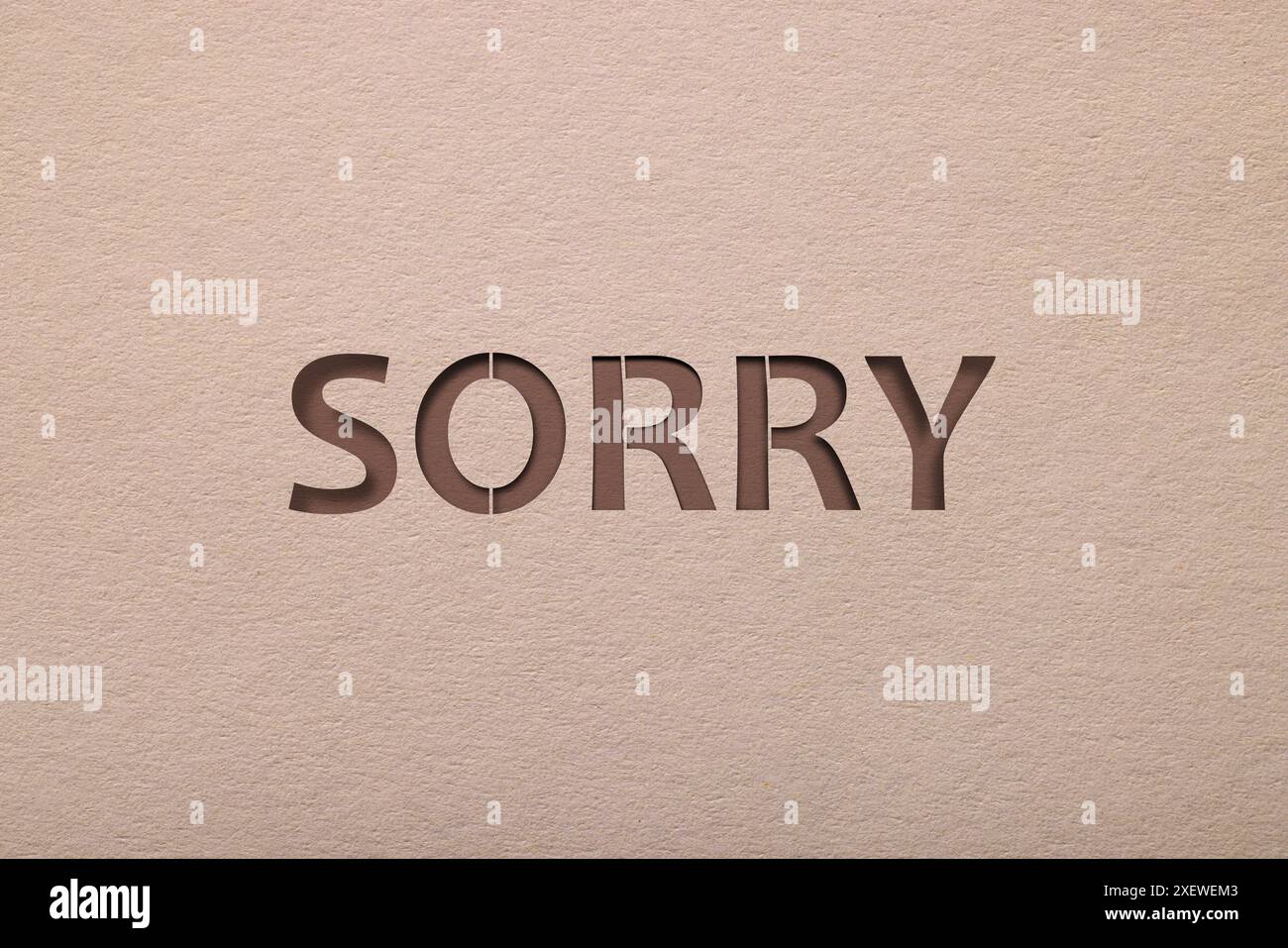 Word Sorry on beige background, apology card design Stock Photo - Alamy