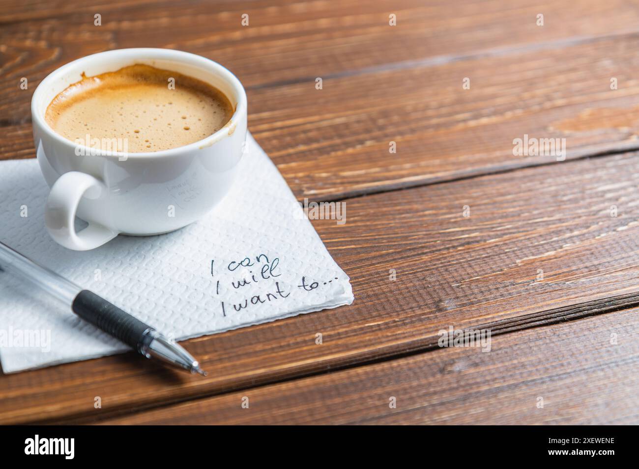 Hand written note on a coffee stained napkin with an empowe Stock Photo ...