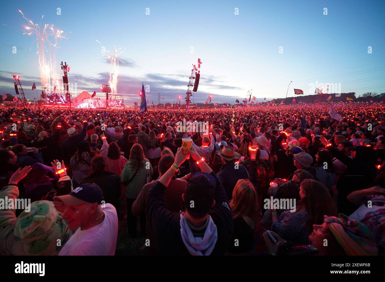 The crowd watching Coldplay performing on the Pyramid Stage at the ...