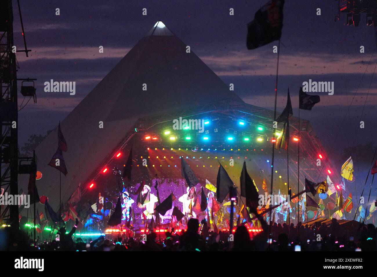 The crowd watching Coldplay performing on the Pyramid Stage at the ...