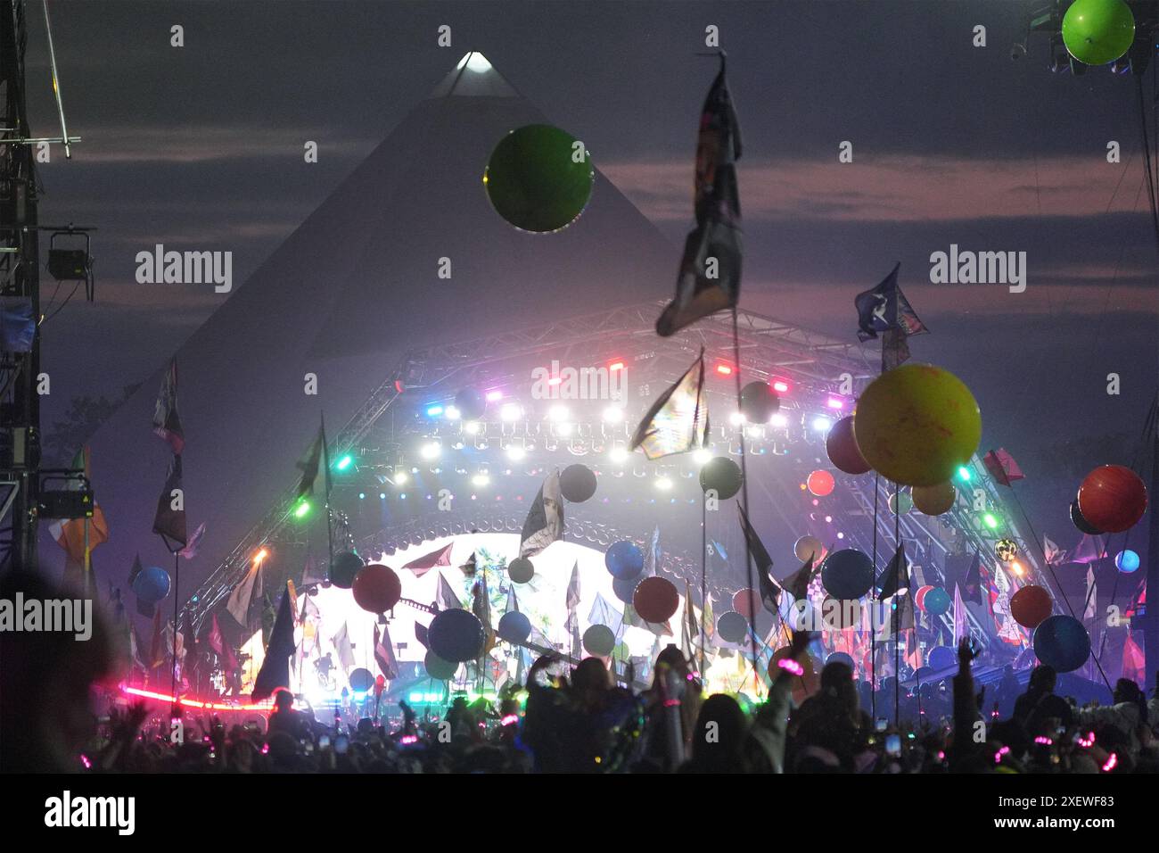 The crowd watching Coldplay performing on the Pyramid Stage at the ...
