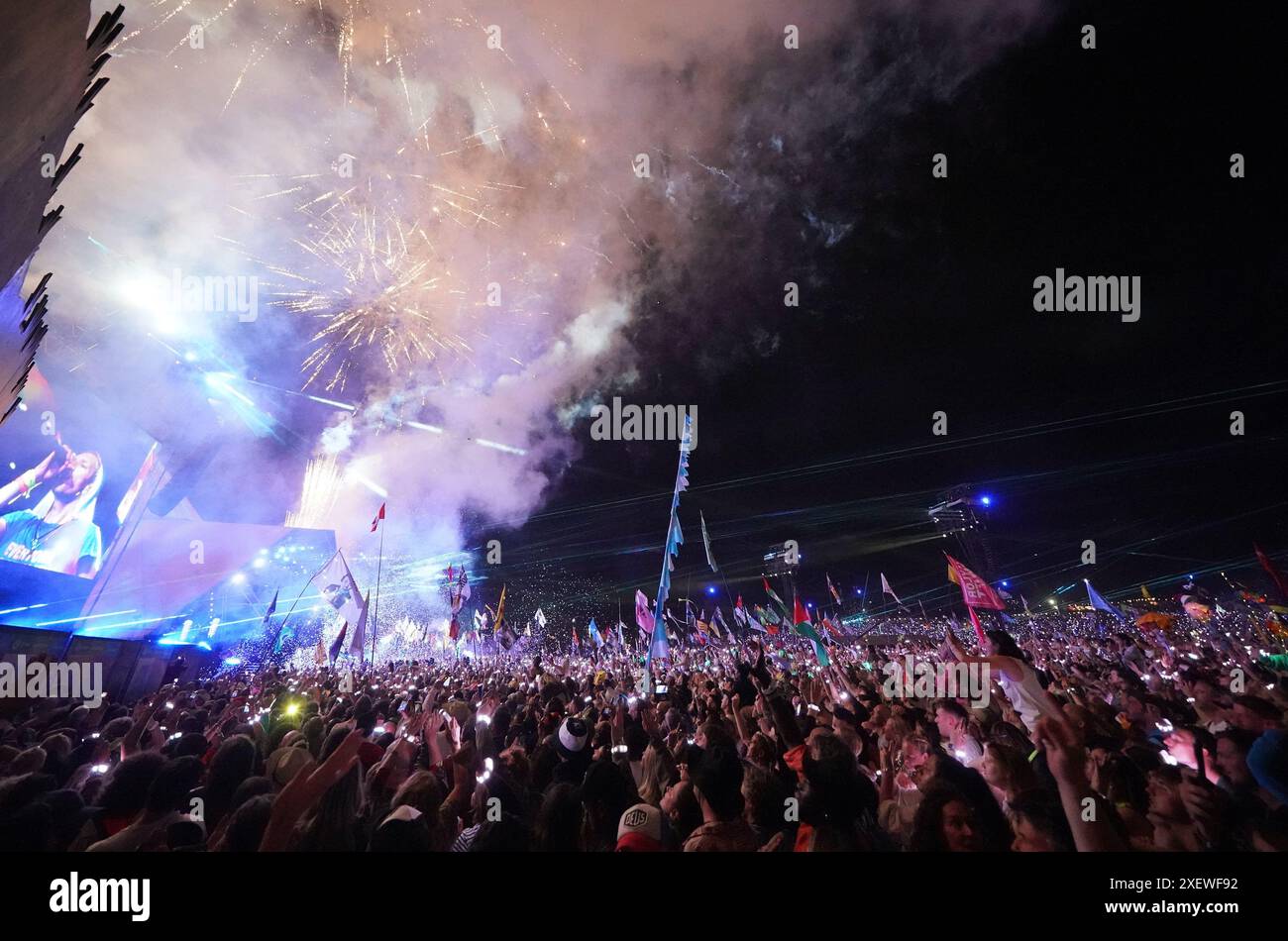 The crowd watching Coldplay performing on the Pyramid Stage at the ...