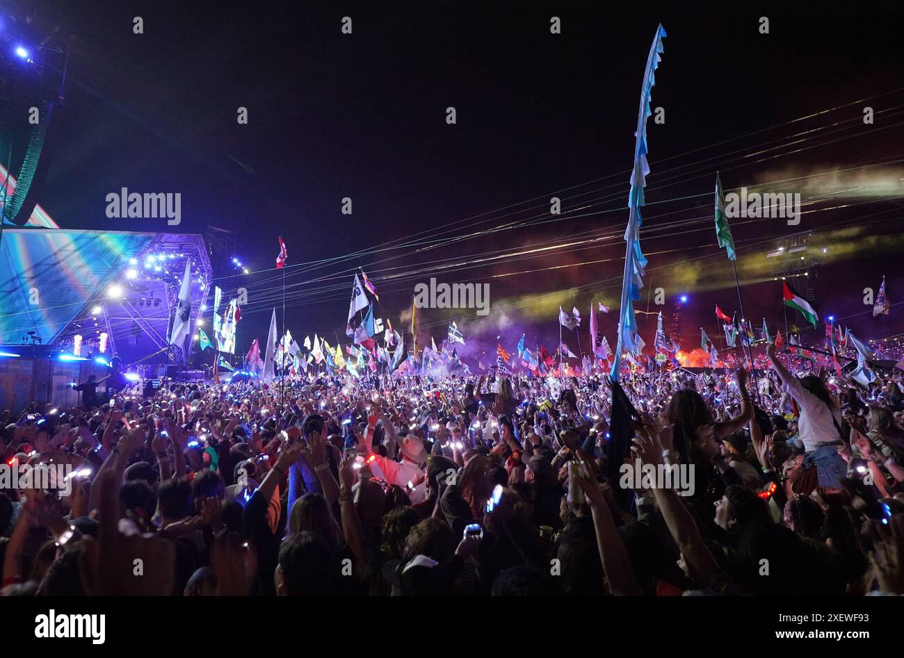 The crowd watching Coldplay performing on the Pyramid Stage at the ...