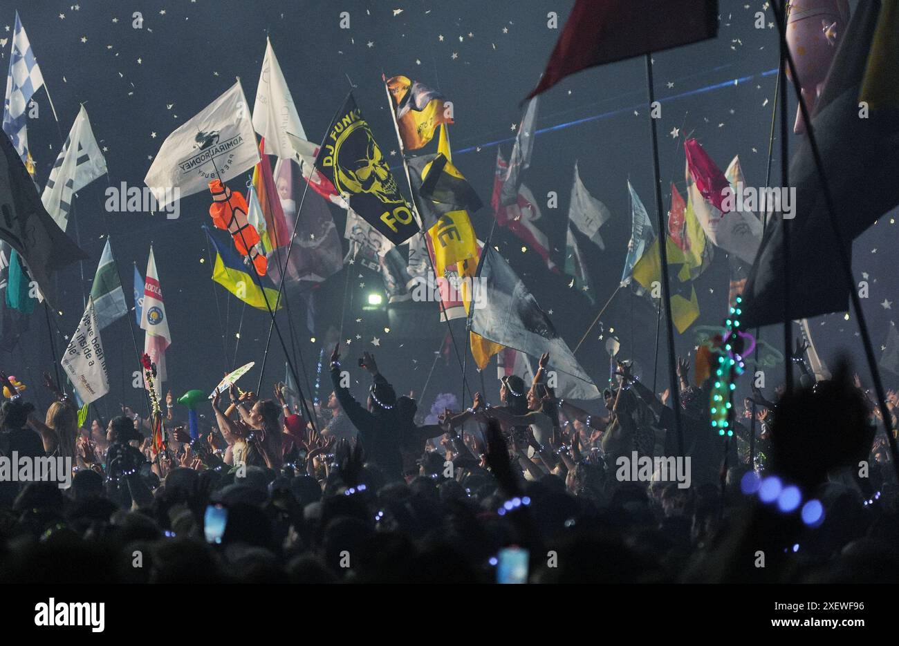 The crowd watching Coldplay performing on the Pyramid Stage at the ...