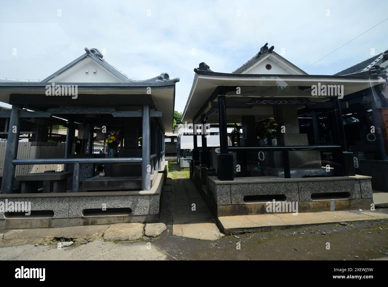 A traditional cemetery in the foothills of Sakurajima, Kyushu, Japan ...