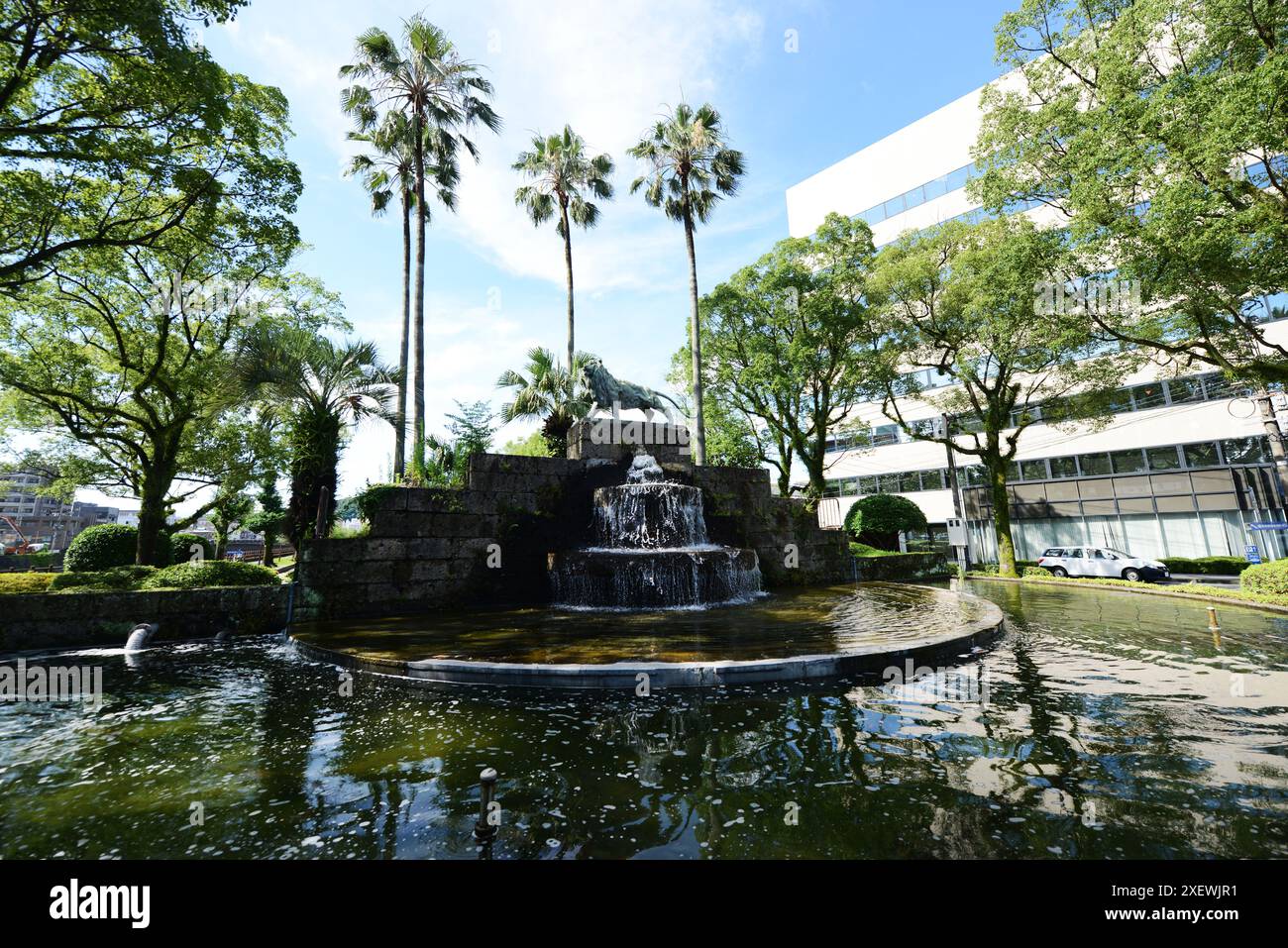 A water fountain with a bronze sculputre of a lion in Lyons park in ...