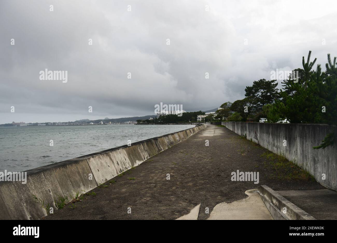 Walking along the waterfront promenade in the HIgashikata park in north ...