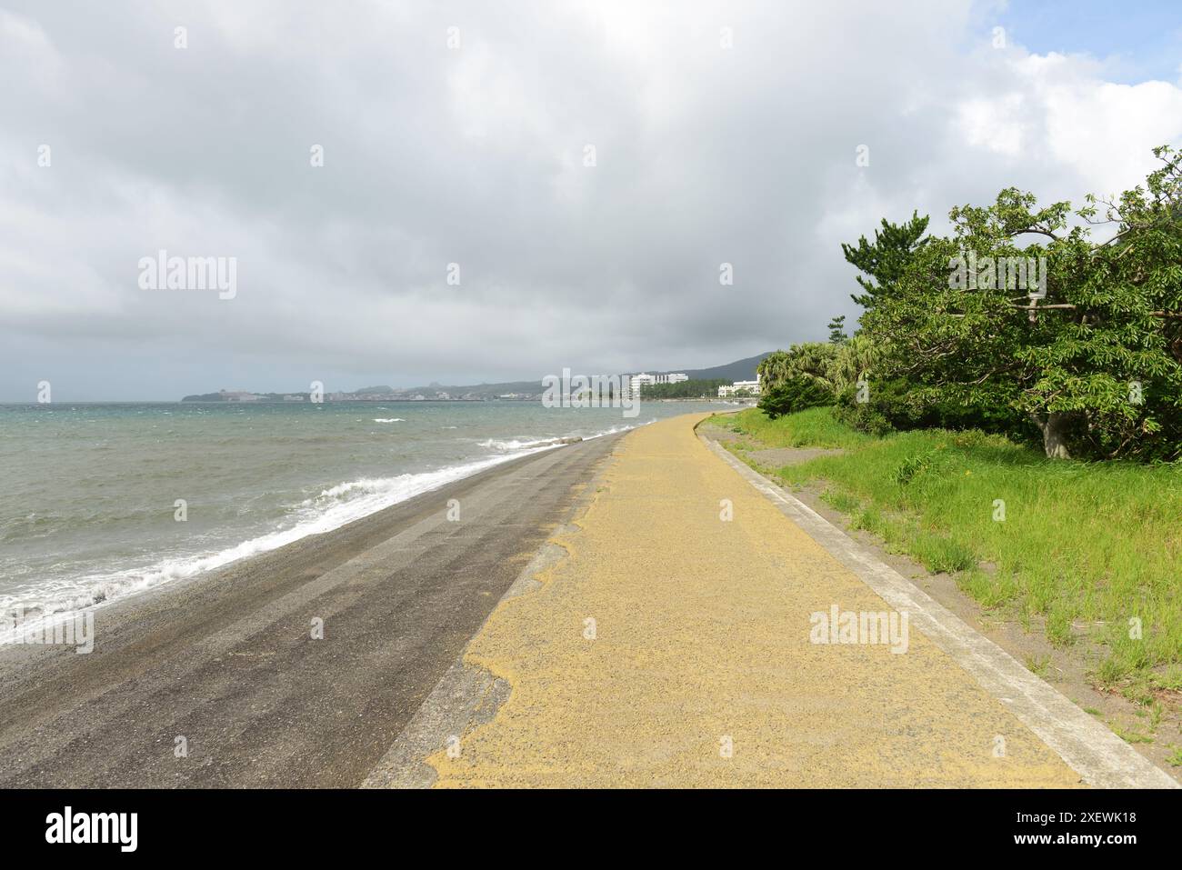 Walking along the waterfront promenade in the HIgashikata park in north ...