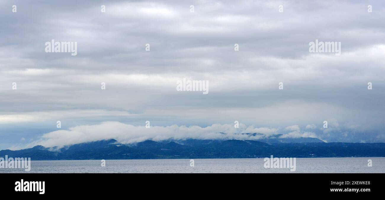 A view of Kagoshima Bay and the misty mountains in the Kimotsuki ...