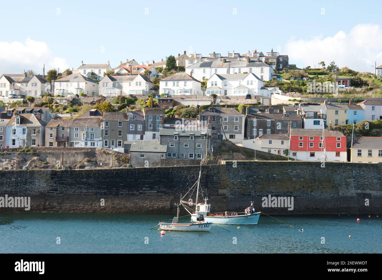 Mevagissey Harbour and Town, Cornwall, UK; The village nestles in a ...
