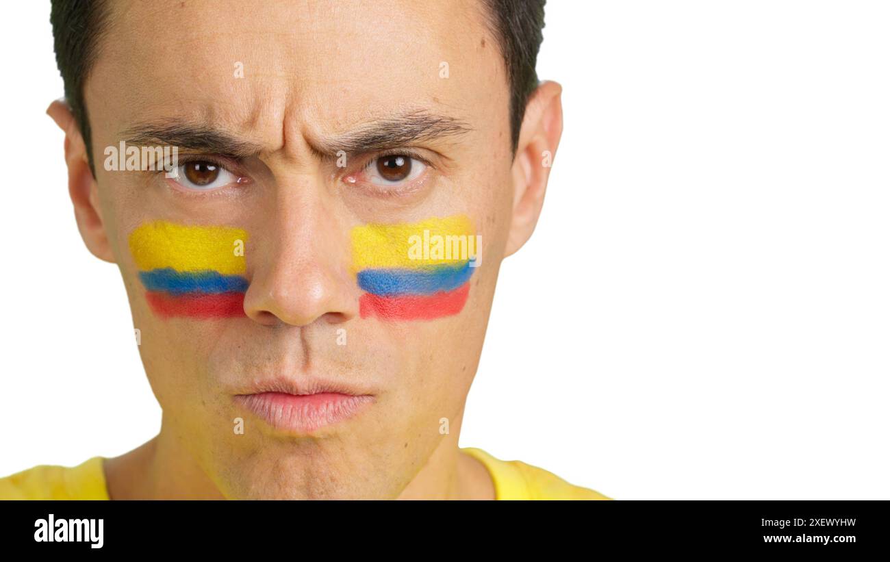 Serious man with a colombian flag painted on the face Stock Photo - Alamy