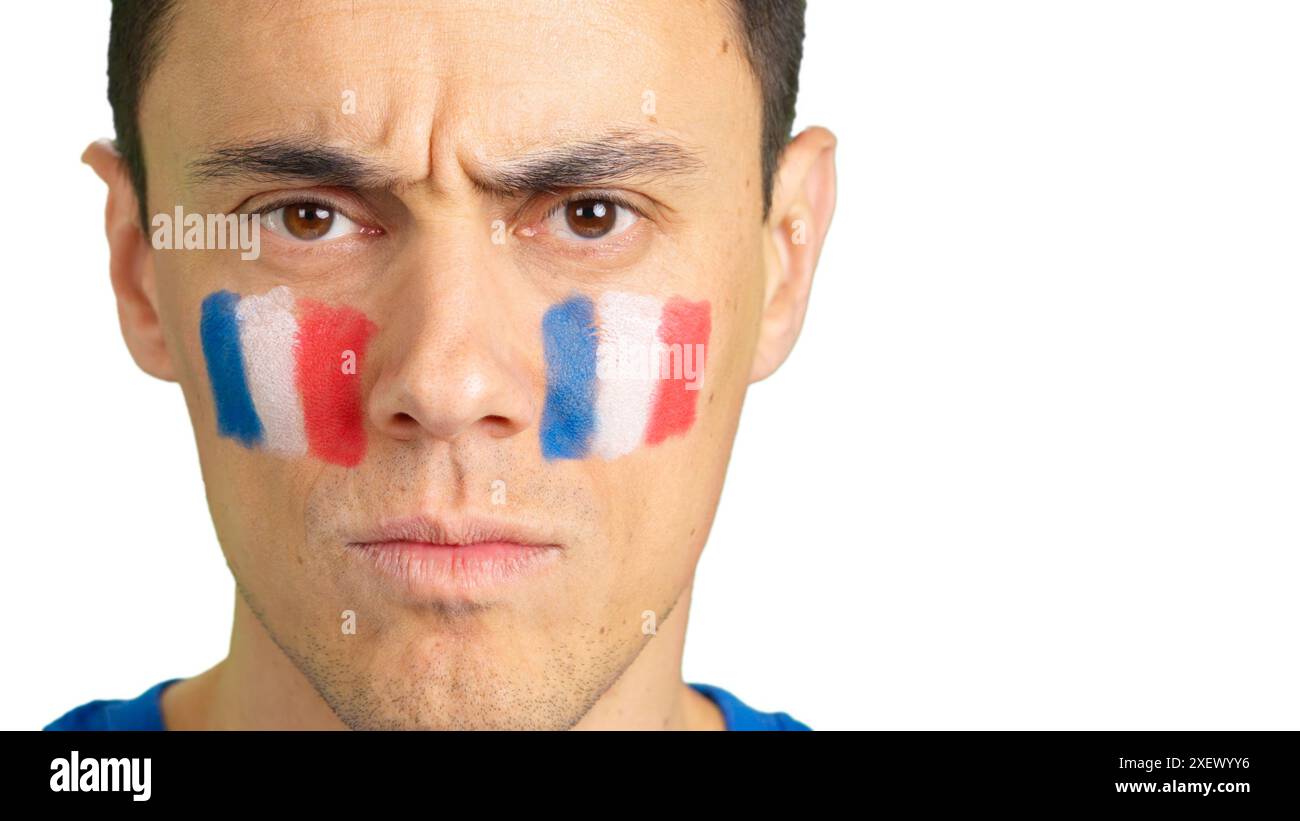 Serious man with a french flag painted on the face Stock Photo - Alamy