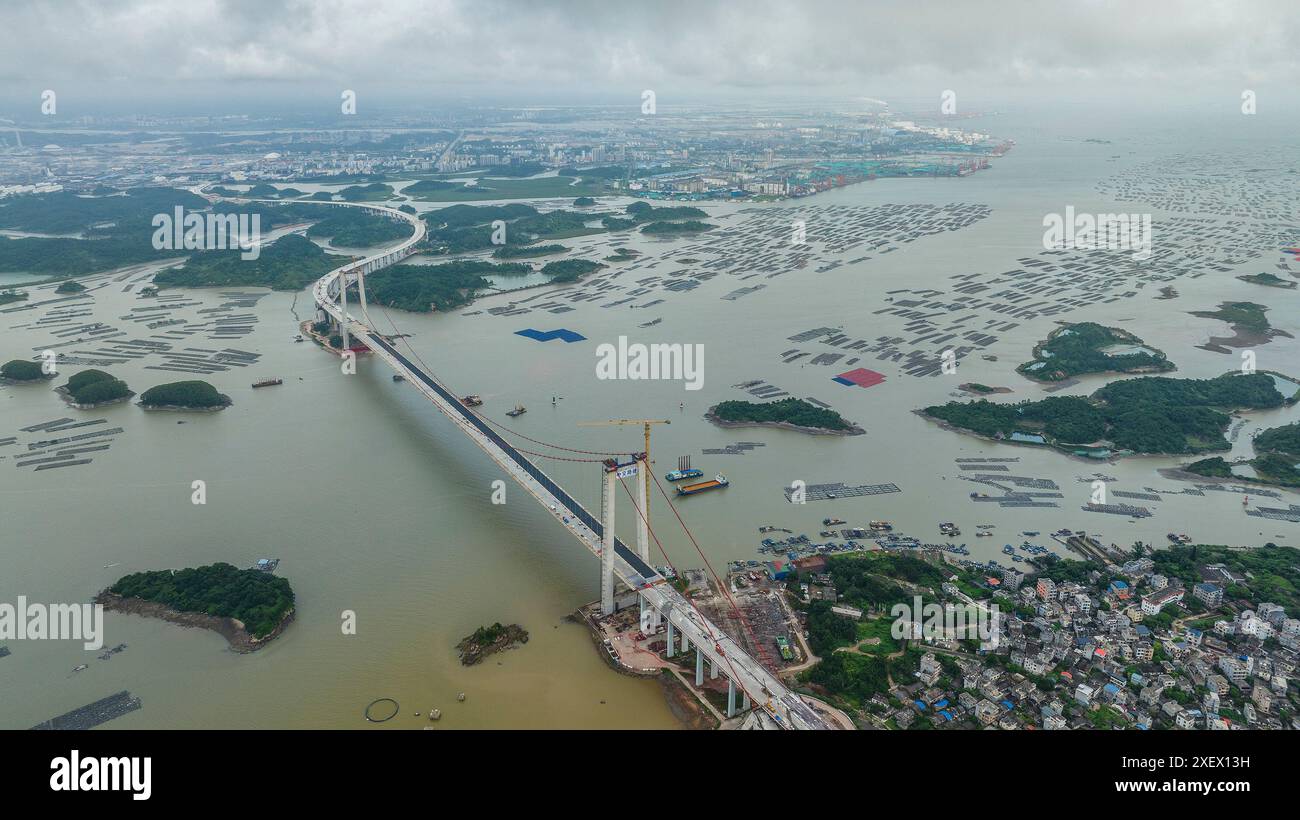 FANGCHENGGANG, CHINA - JUNE 29, 2024 - Longmen Bridge, the longest ...