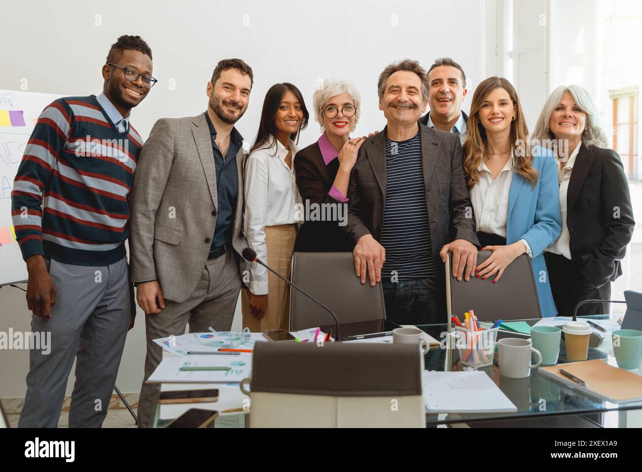 Portrait of a diverse business team smiling together - Professional ...