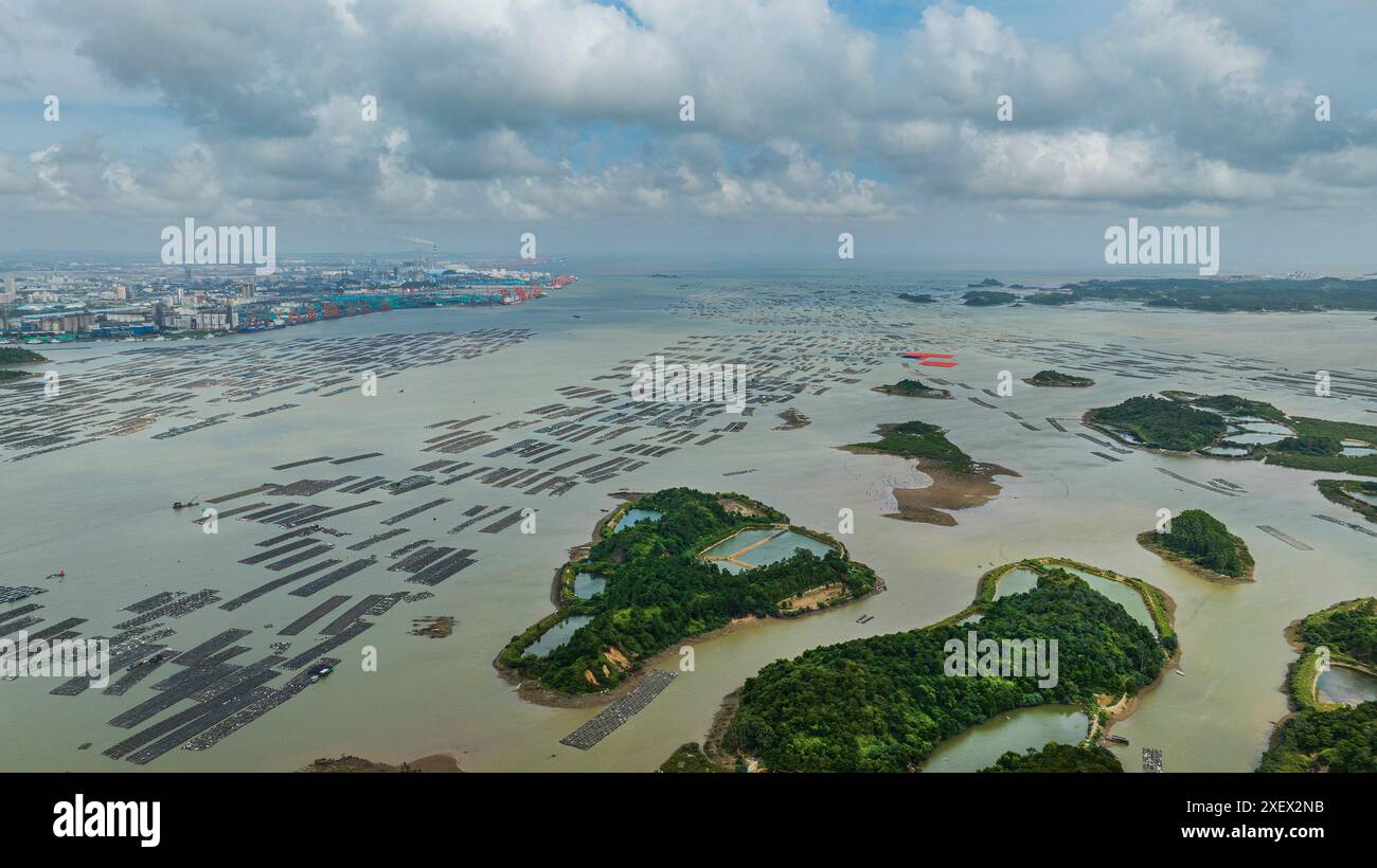 FANGCHENGGANG, CHINA - JUNE 29, 2024 - Longmen Bridge, the longest ...