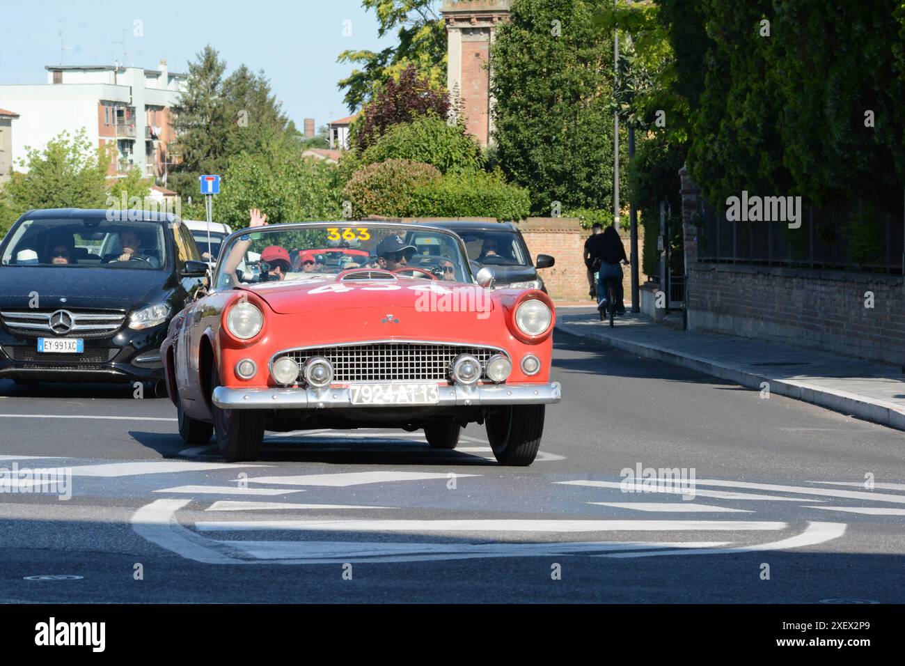 FERRARA , ITALY - jun 15 -2024 : A classic car races through the ...