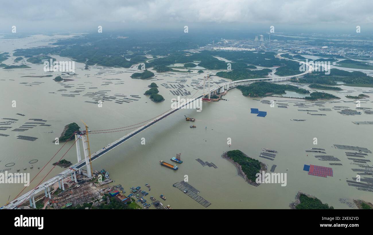 FANGCHENGGANG, CHINA - JUNE 29, 2024 - Longmen Bridge, the longest ...