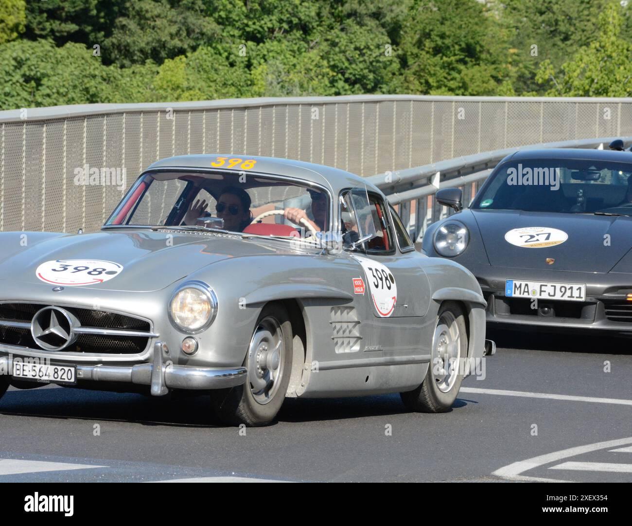FERRARA , ITALY - jun 15 -2024 : A classic car races through the ...