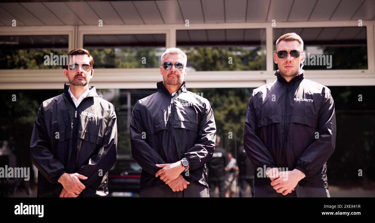 Professional Security Guard Ensuring Event Safety with His Team of ...