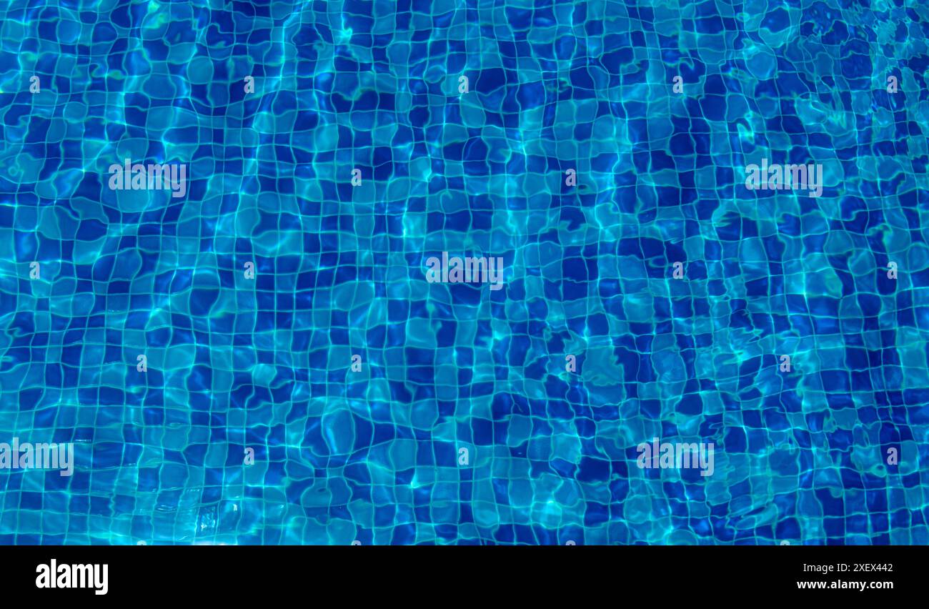 Beautiful sun reflections of water in the pool. Summer. Flight holidays ...
