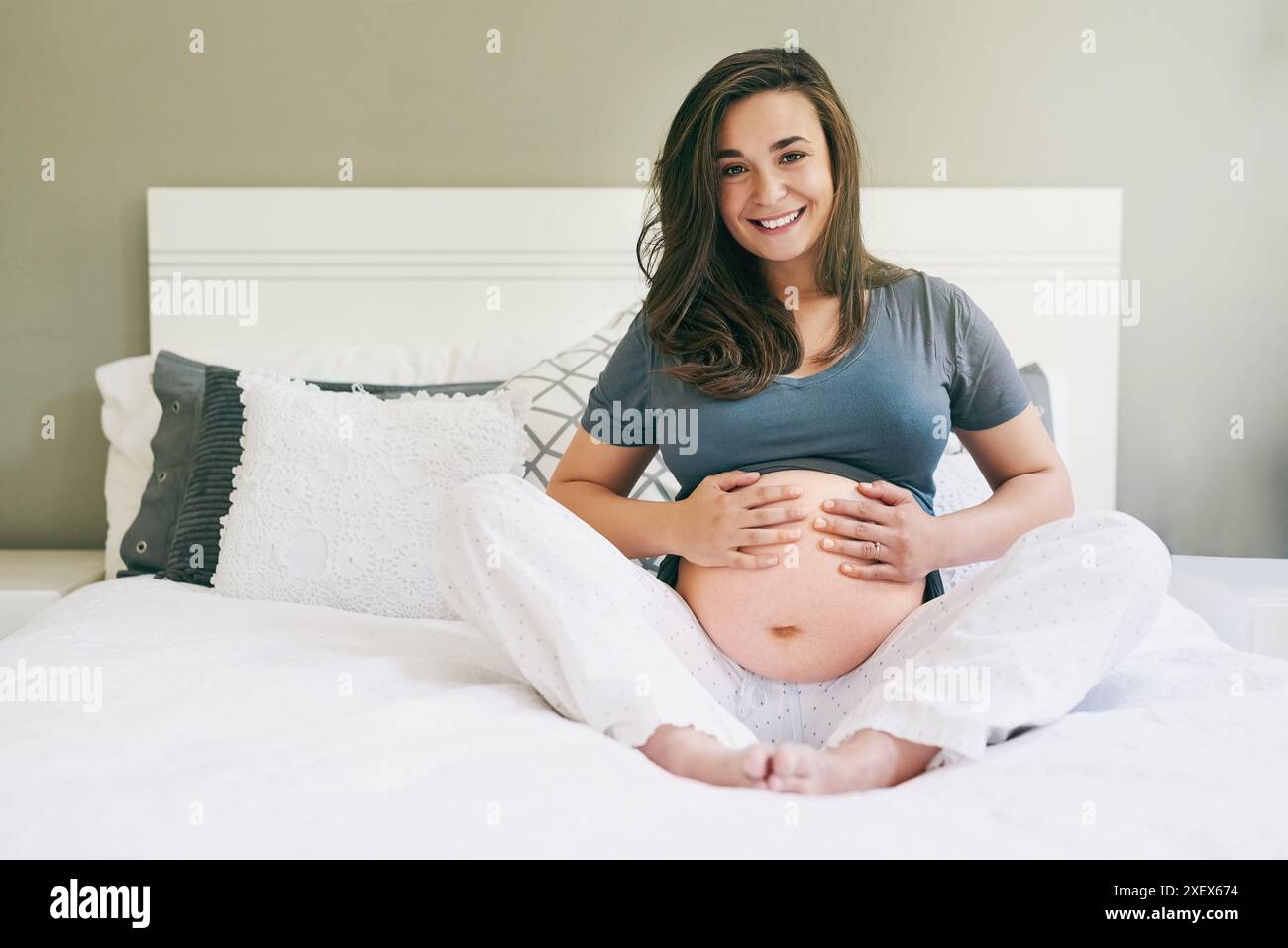 Portrait, smile and pregnant woman touch stomach in home bedroom for ...